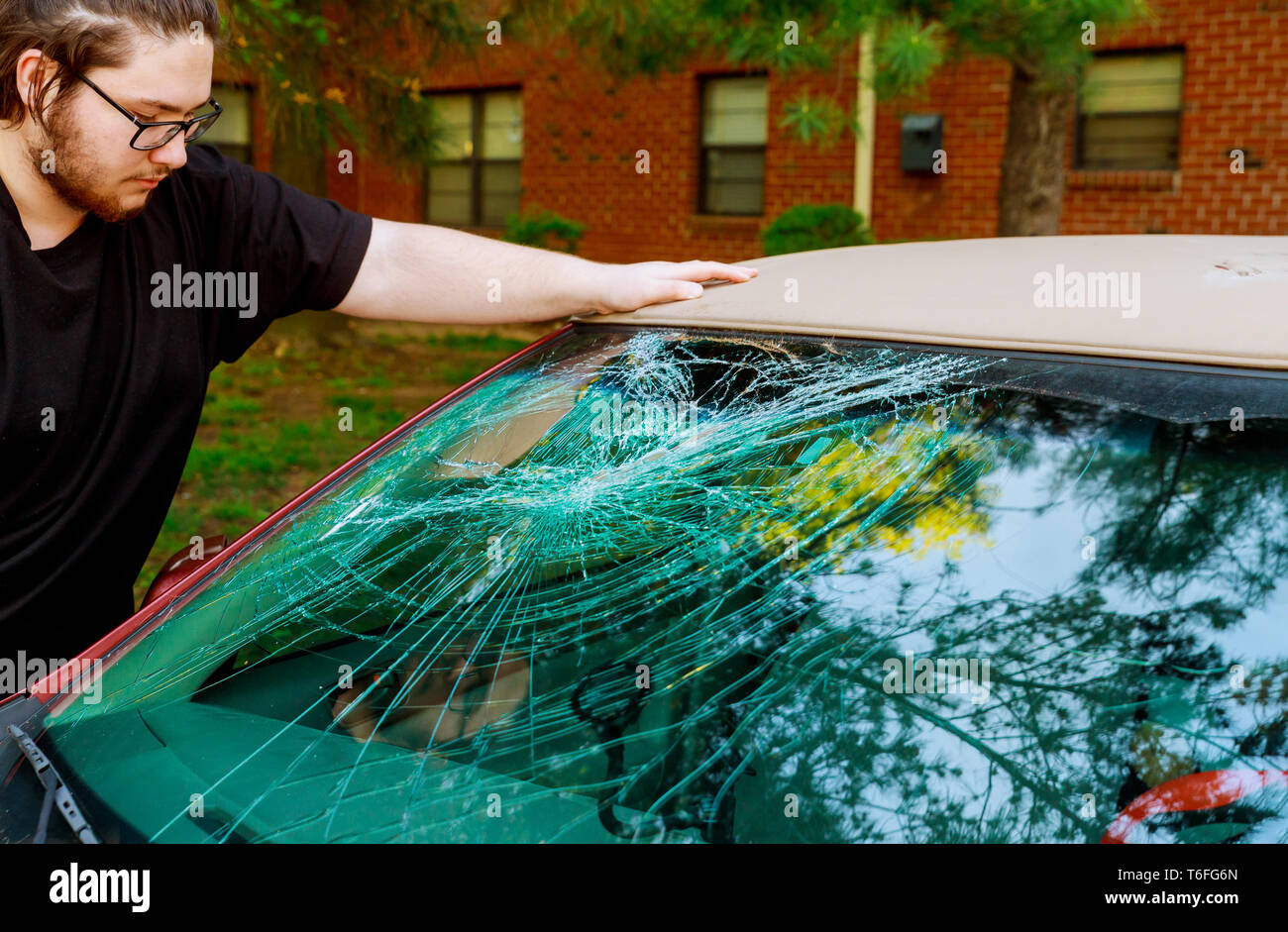 Glass broken an accident on the road in front of car front window Stock ...