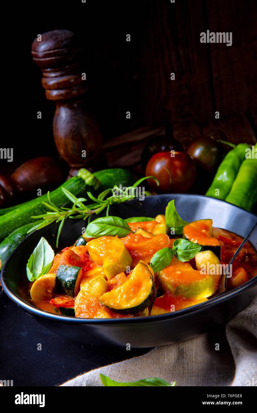 vegetarian ratatouille with fresh vegetables and herbs Stock Photo - Alamy