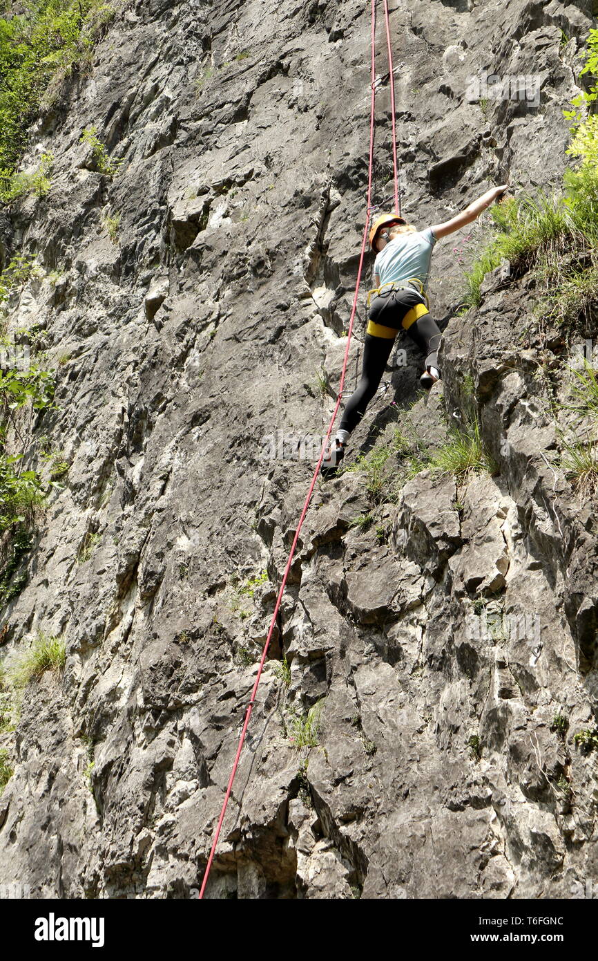 Girl climbing cave hi-res stock photography and images - Alamy