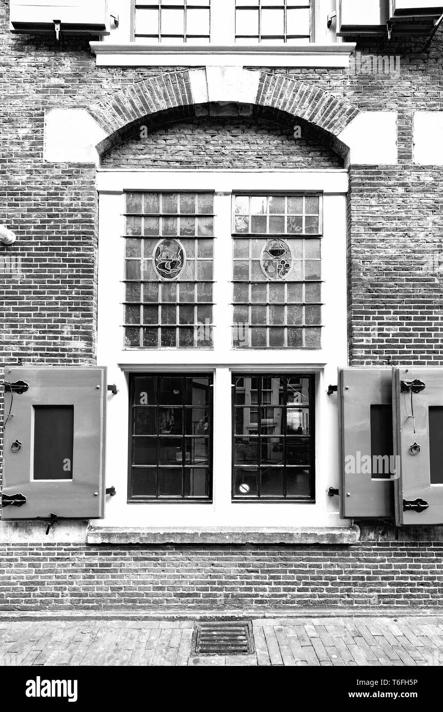 Brick building facade in Black and White Stock Photos & Images - Alamy