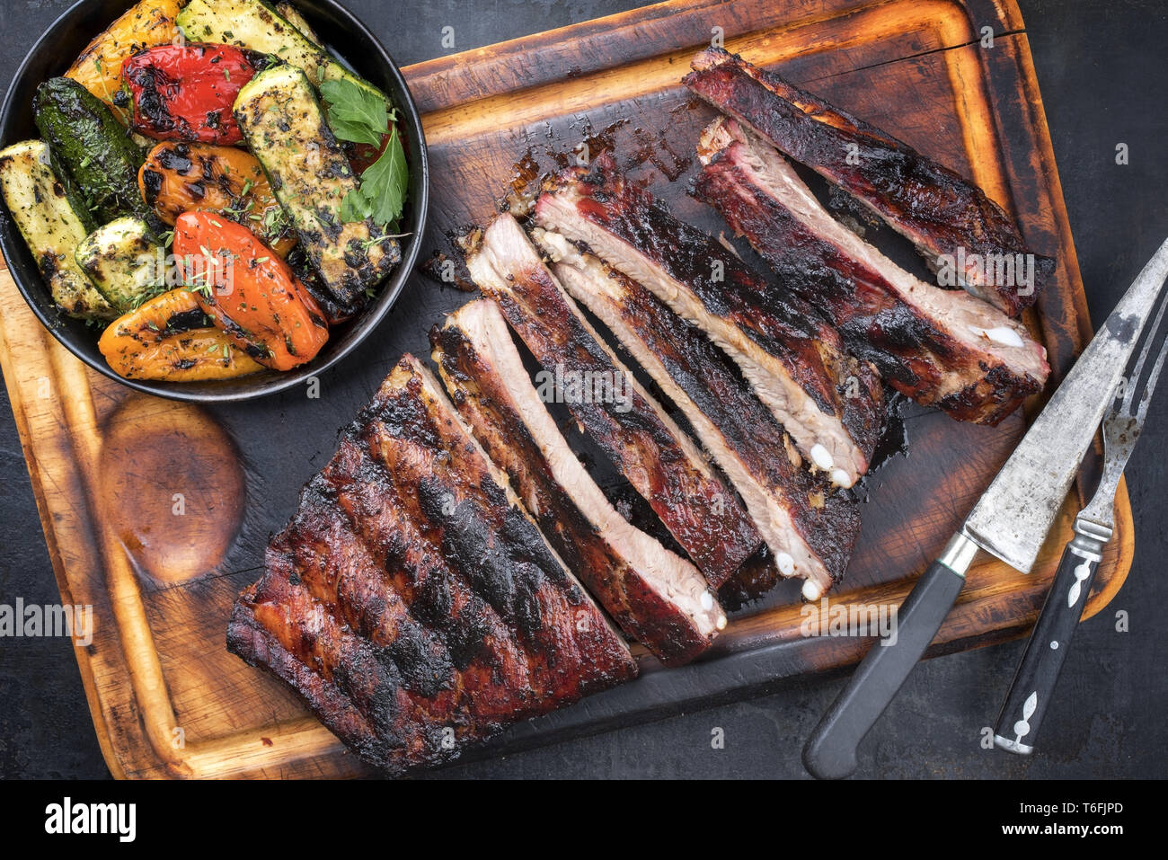 Barbecue spare ribs St Louis cut with hot honey chili marinade sliced ...