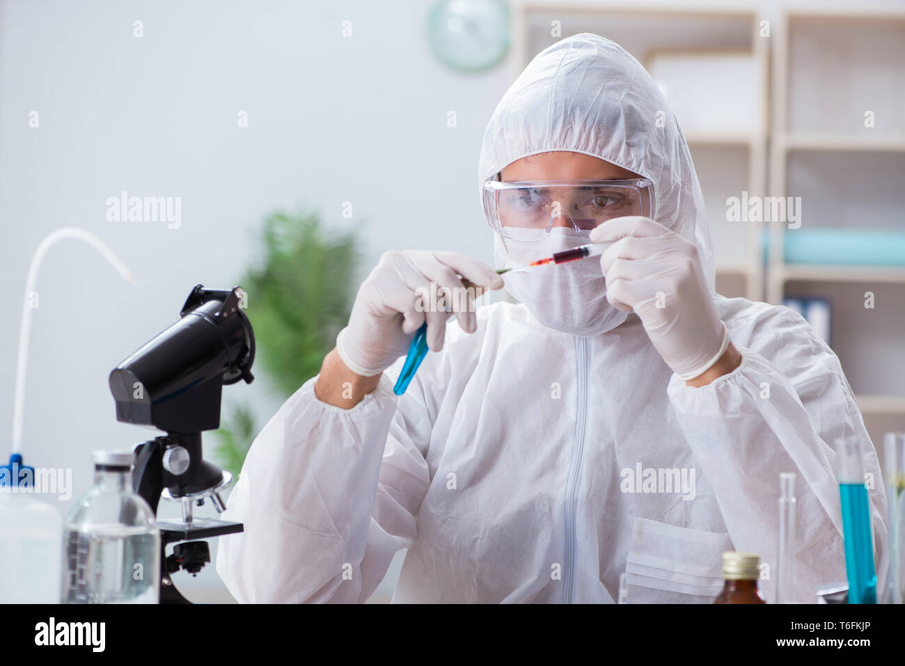 Biotechnology scientist chemist working in lab Stock Photo - Alamy