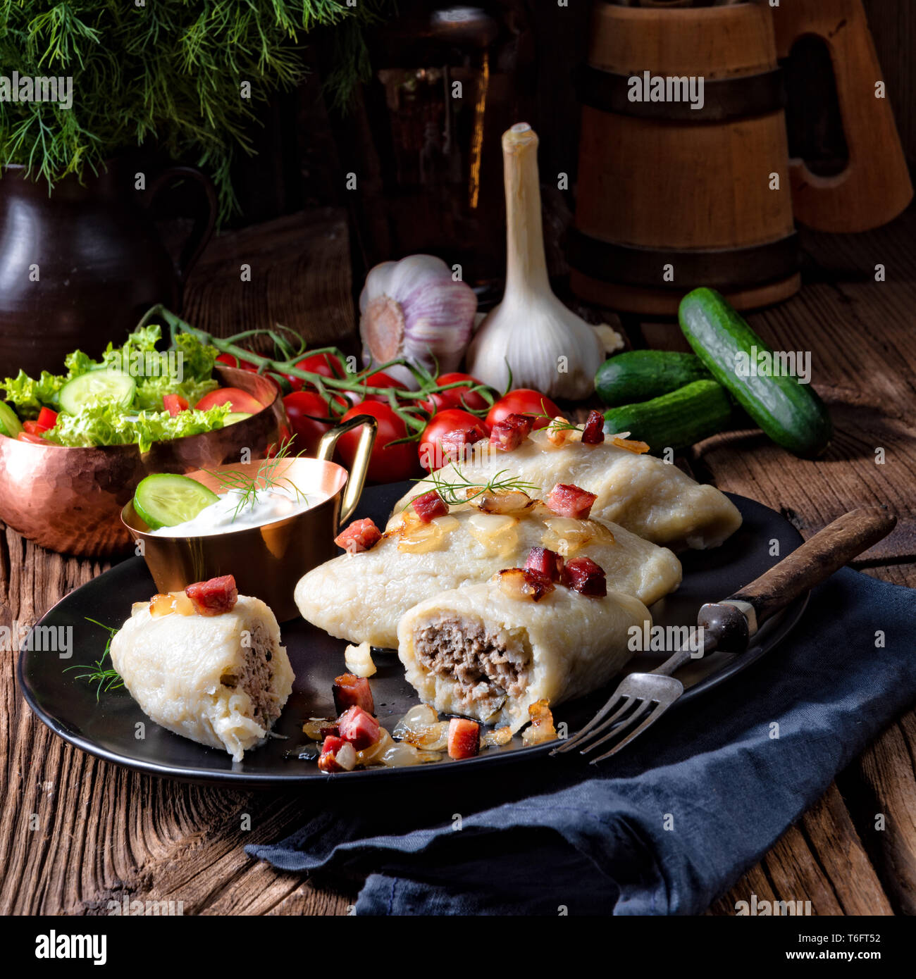 Rustic Cepelinai, a specialty Lithuanian and Polish cuisine Stock Photo ...