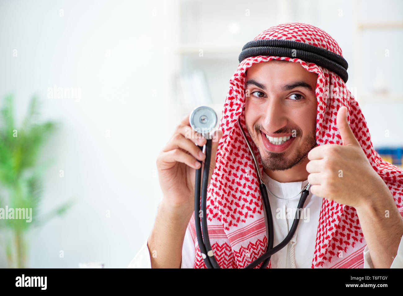 Arab saudi doctor with stethoscope in hospital Stock Photo - Alamy