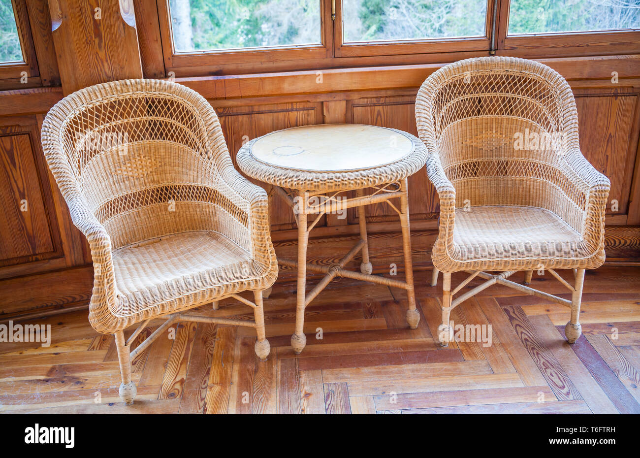 Old wicker chairs Stock Photo - Alamy