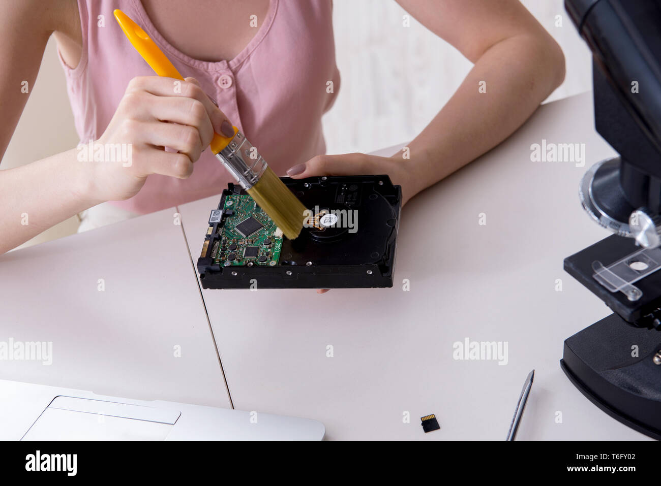 Hard drive repair and data recovery with restoration Stock Photo - Alamy
