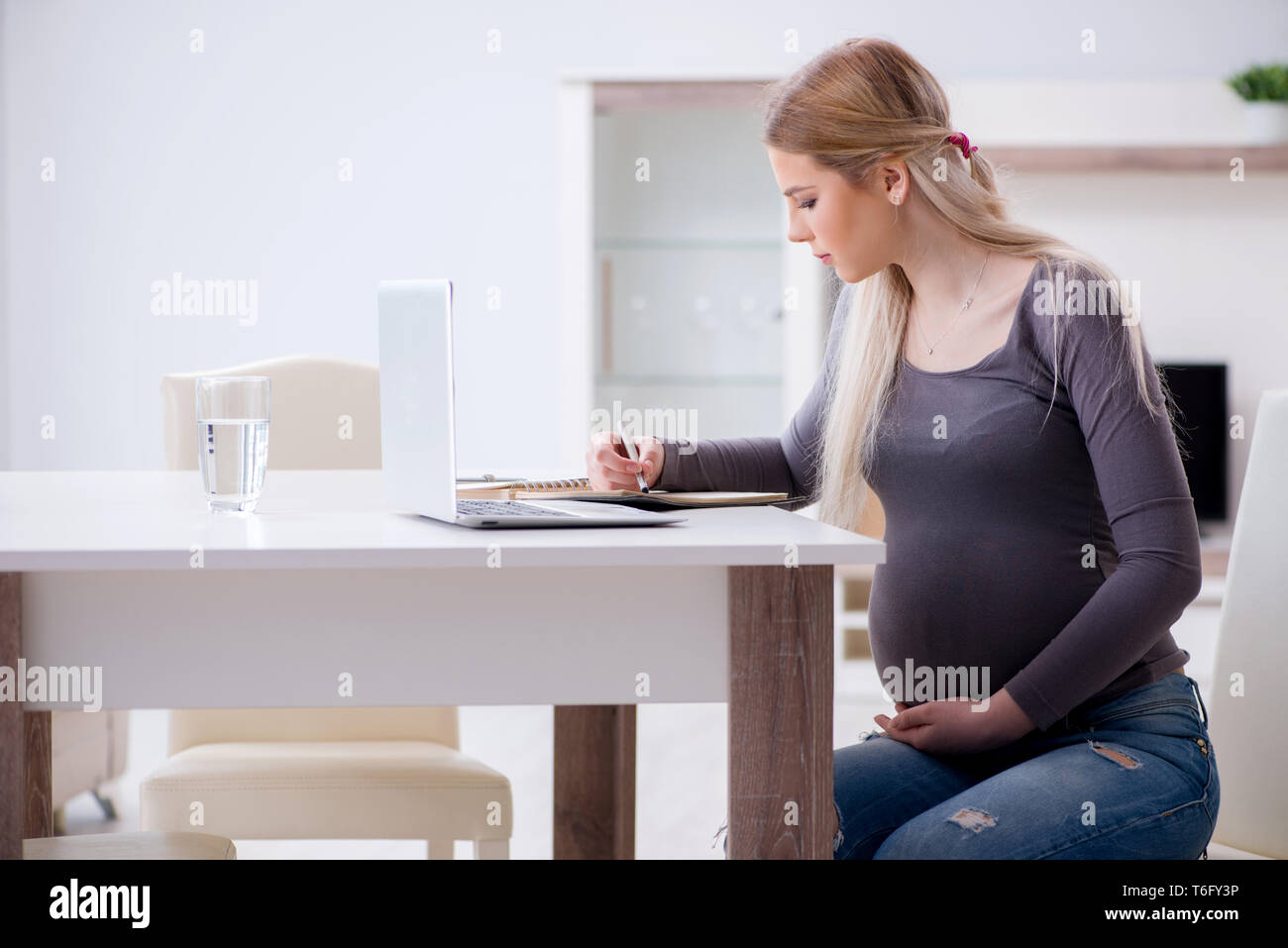 Pregnant woman at home getting ready for childbirth Stock Photo - Alamy
