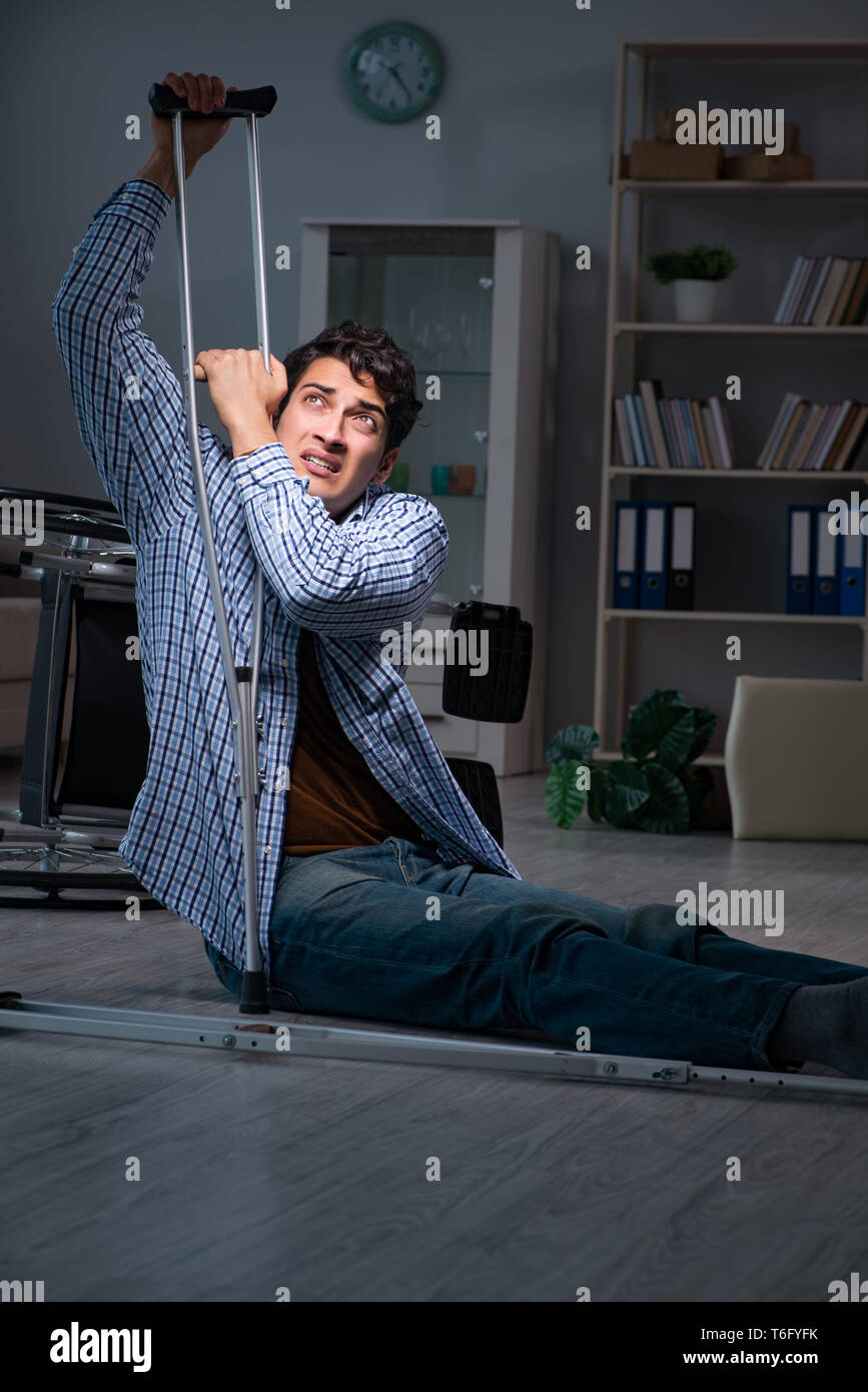 Man falling off chair hi-res stock photography and images - Alamy