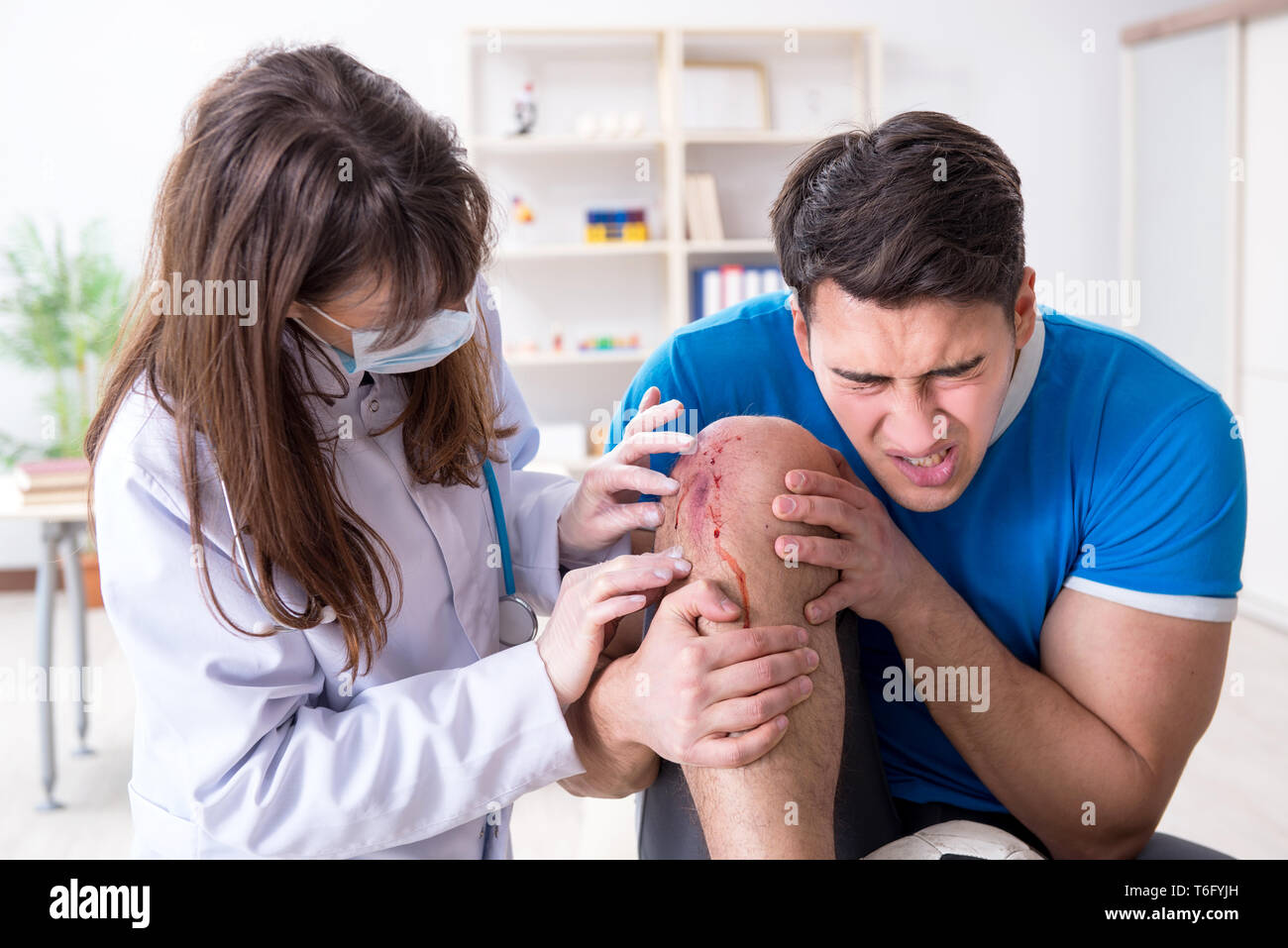 Patient visiting doctor after sustaining sports injury Stock Photo - Alamy