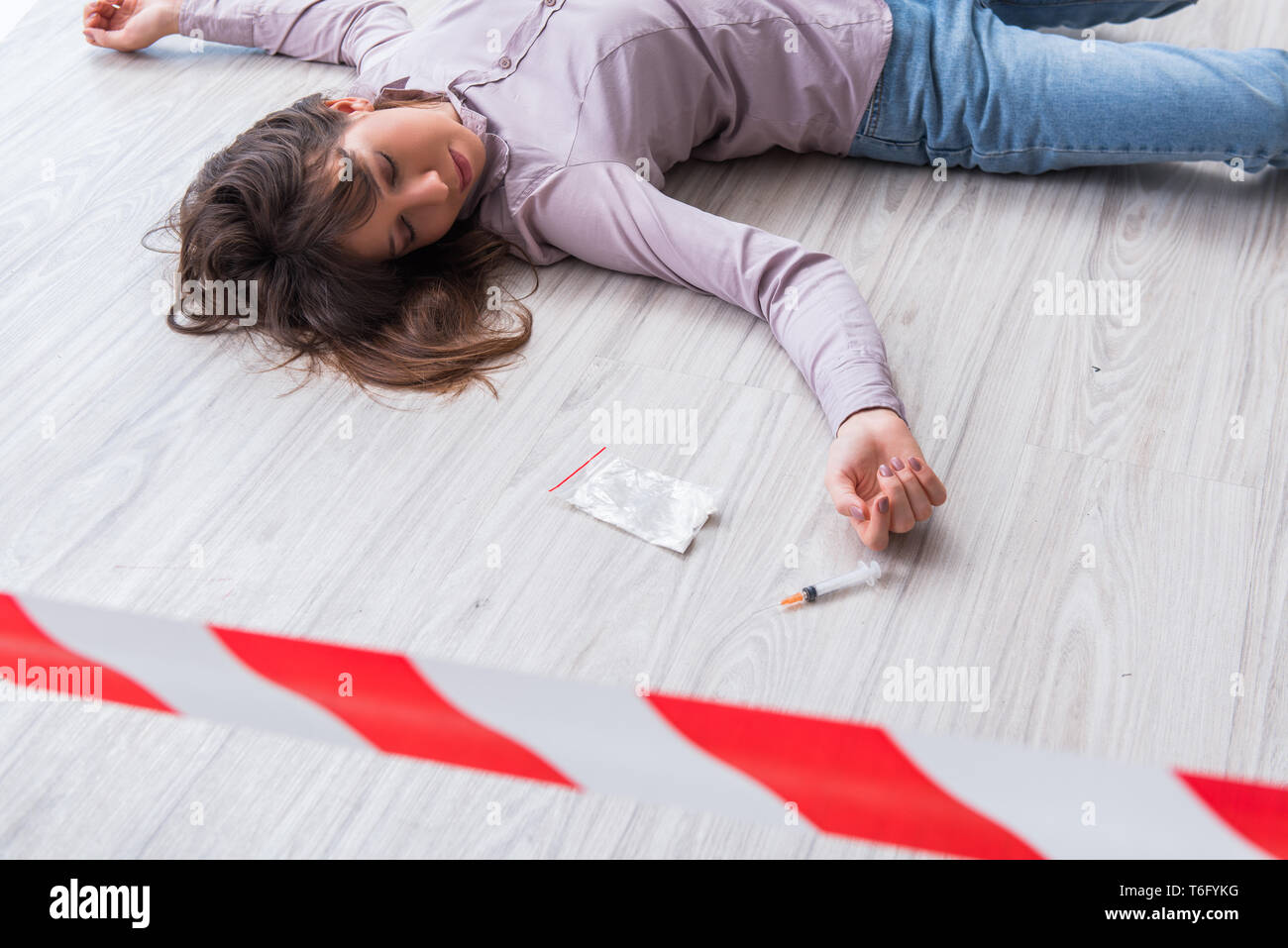 Dead woman lying on the floor hi-res stock photography and images - Alamy