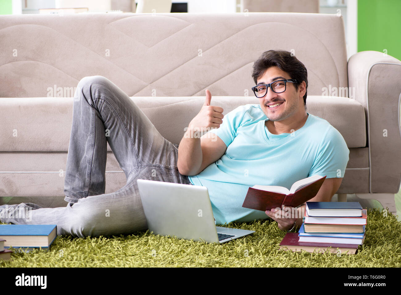 Student preparing for university exams at home Stock Photo - Alamy