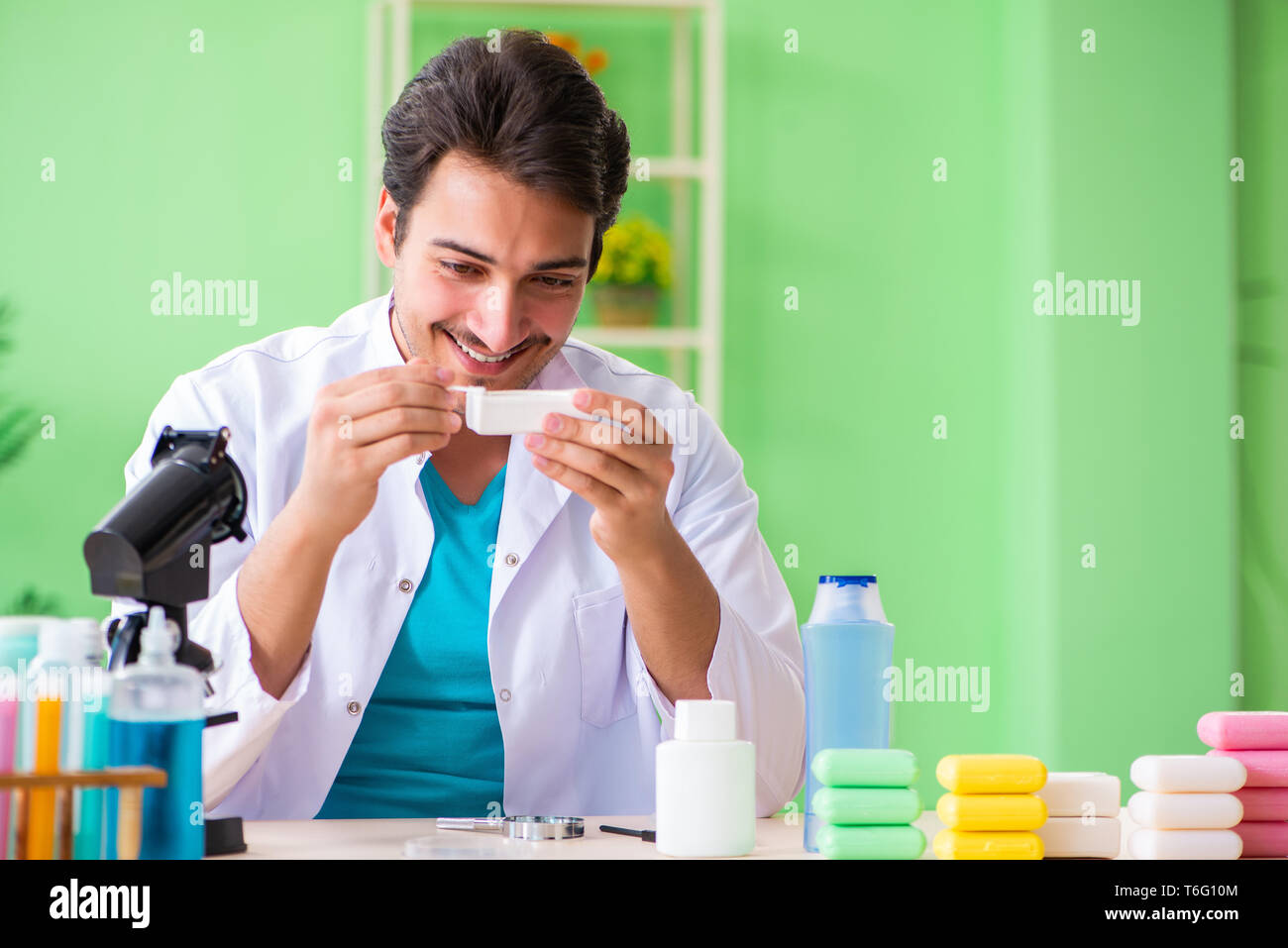 Chemist testing soap in the lab Stock Photo - Alamy