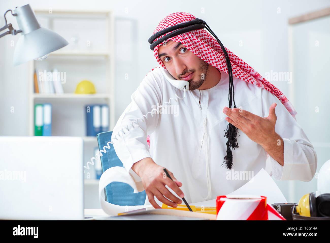 Arab engineer working on new project Stock Photo - Alamy