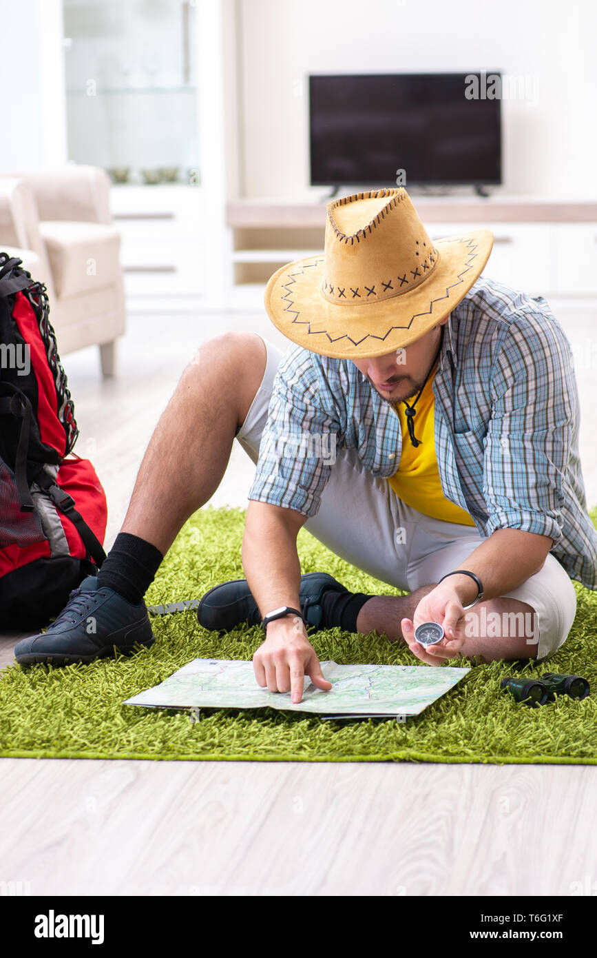 Man planning his travel with map Stock Photo - Alamy