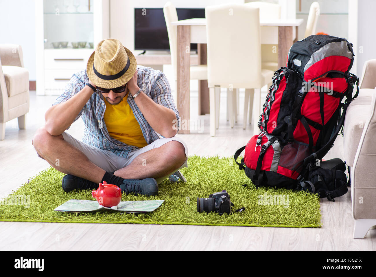 Man planning his travel with map Stock Photo - Alamy