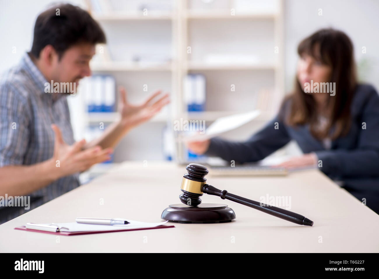 Female lawyer meeting with his male client in the office Stock Photo ...