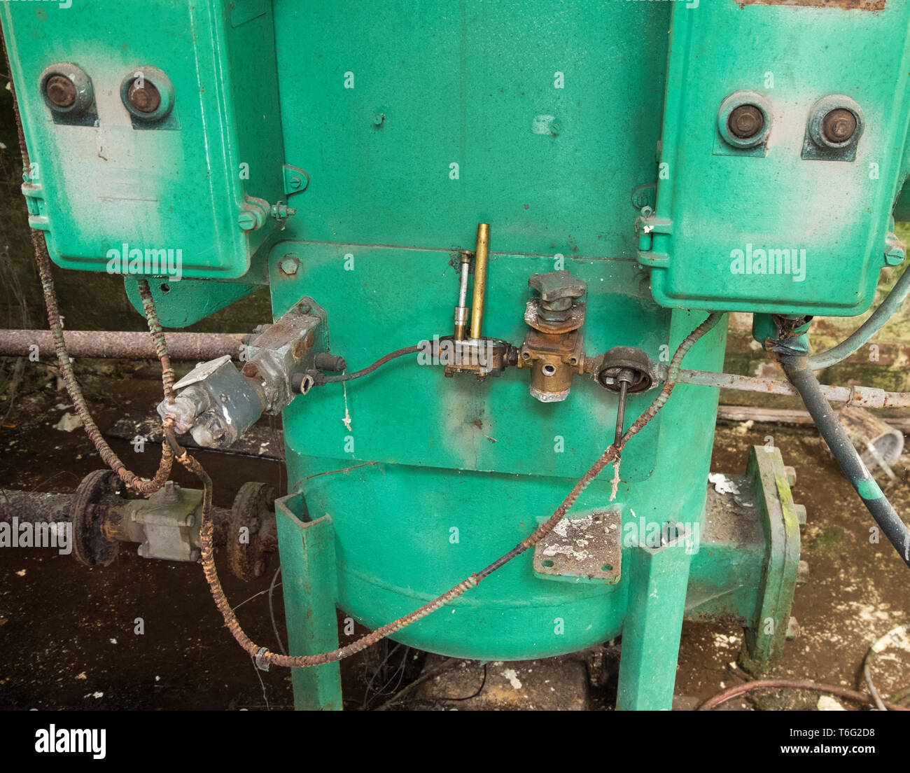 Old abandoned wrecked factory machine Stock Photo - Alamy