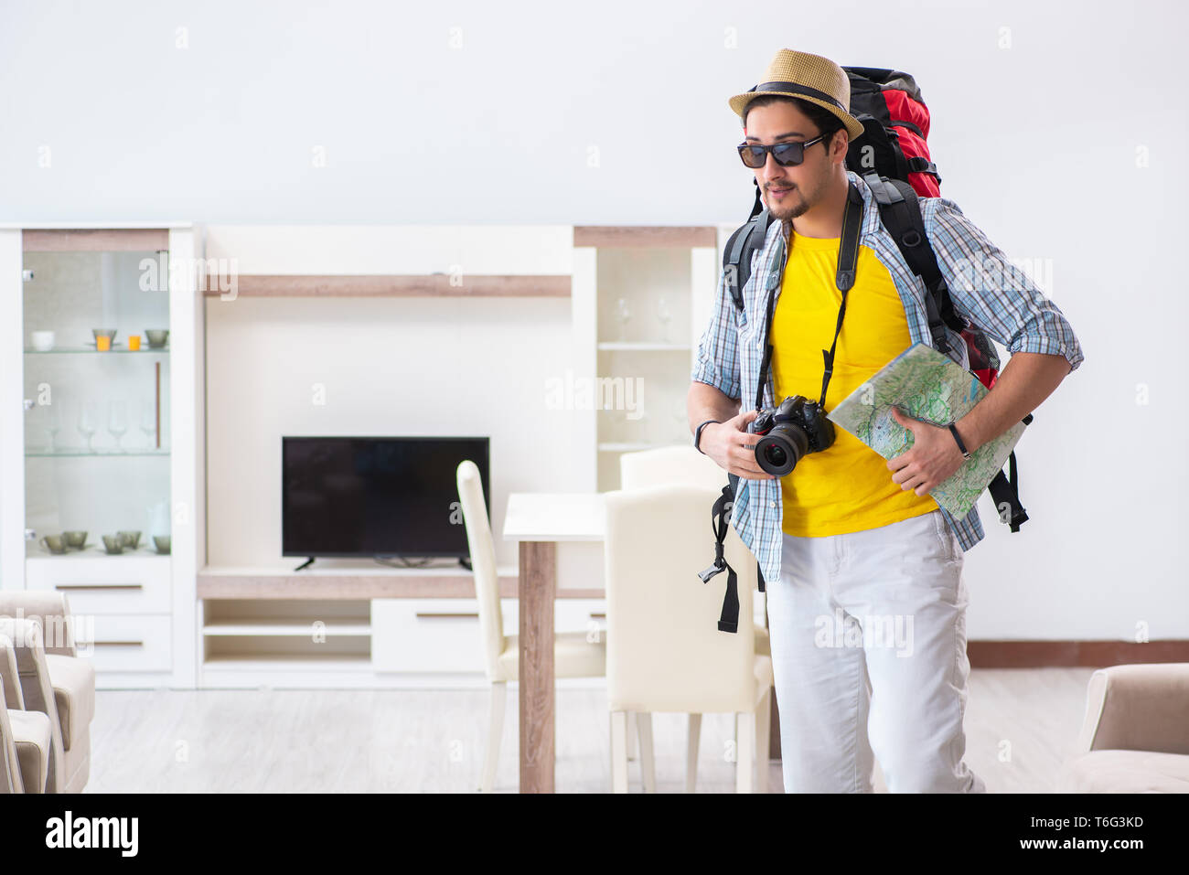 Man planning his travel with map Stock Photo - Alamy