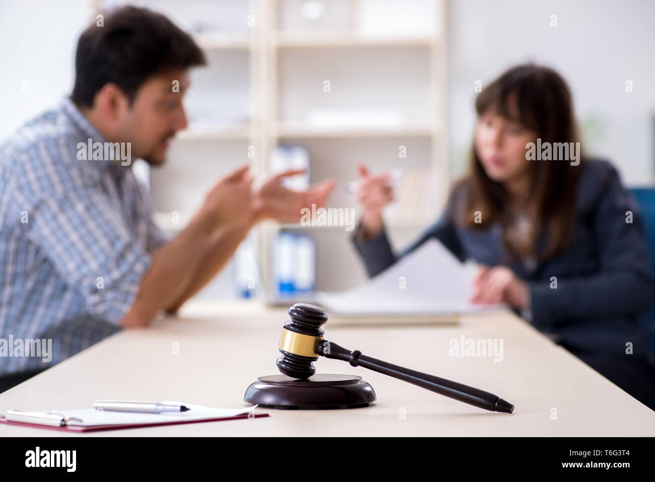 Female lawyer meeting with his male client in the office Stock Photo ...