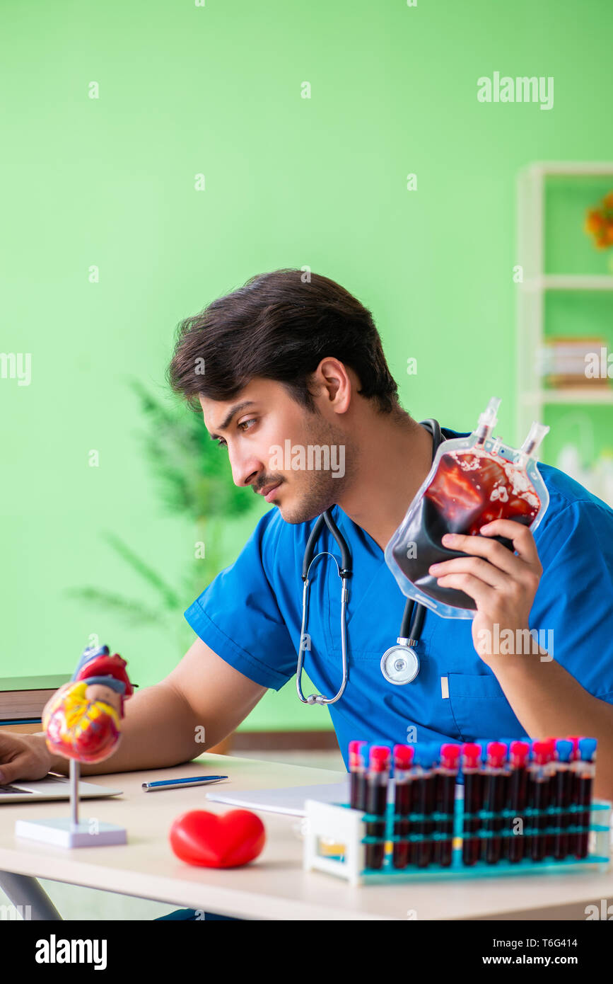 Doctor doing blood analysis in the lab Stock Photo - Alamy