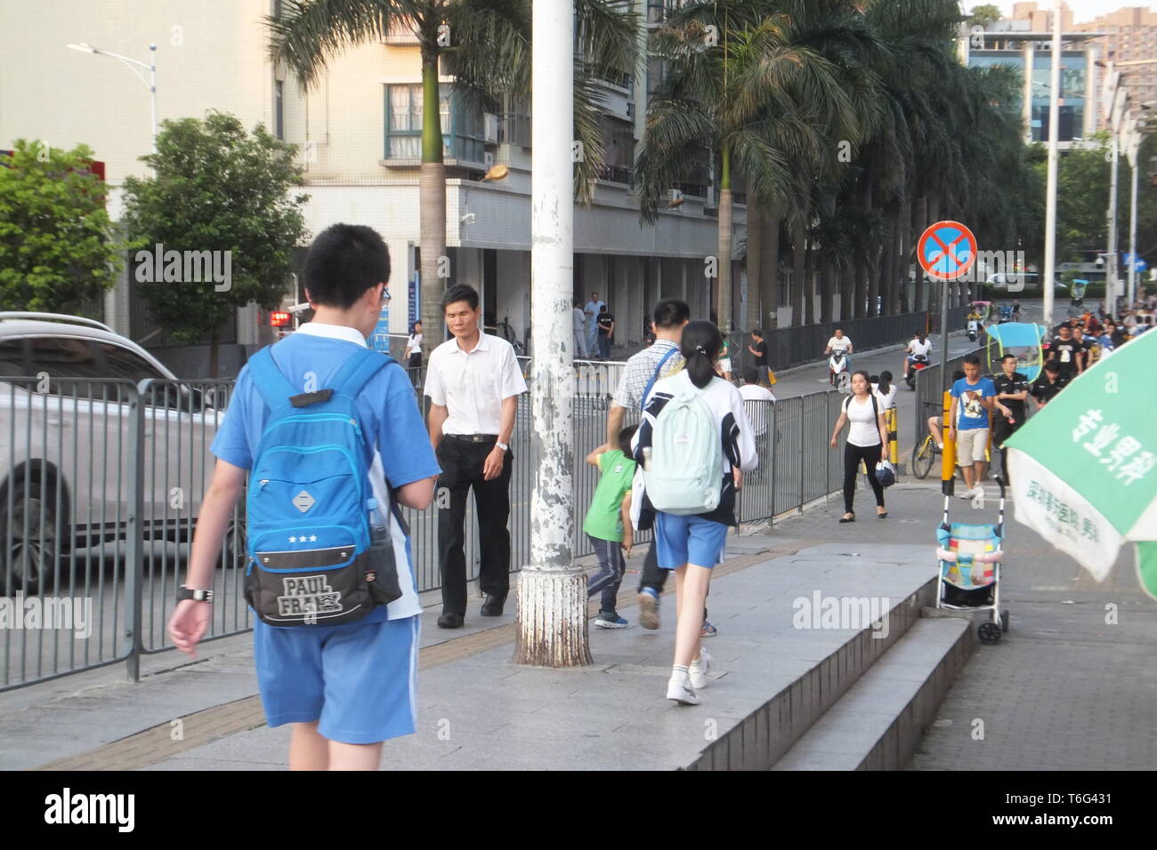 Shenzhen, China: middle school students walk home from school and buy ...