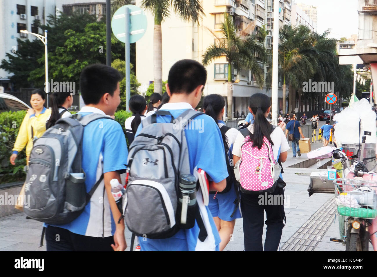 Shenzhen, China: middle school students walk home from school and buy ...