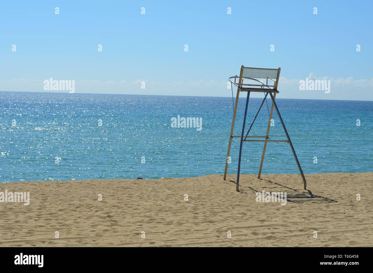 Empty life saver chair at the beach Stock Photo - Alamy
