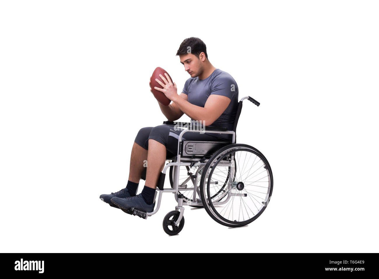Football player recovering from injury on wheelchair Stock Photo - Alamy