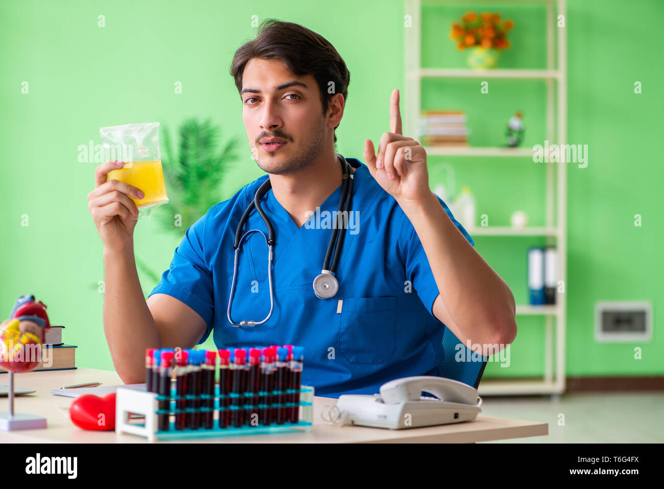 Doctor doing blood analysis in the lab Stock Photo - Alamy