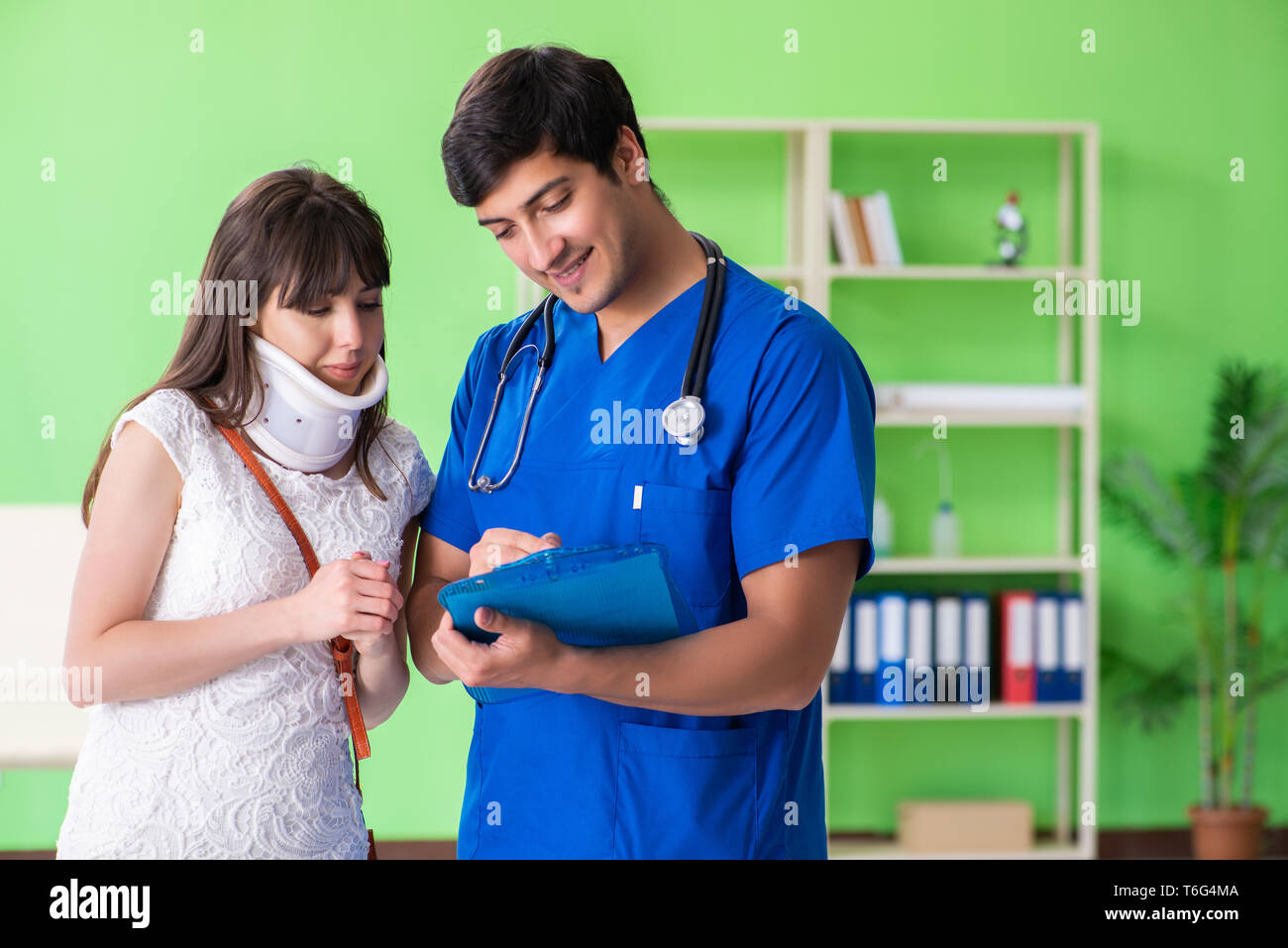 Female patient visiting male doctor in medical concept Stock Photo - Alamy
