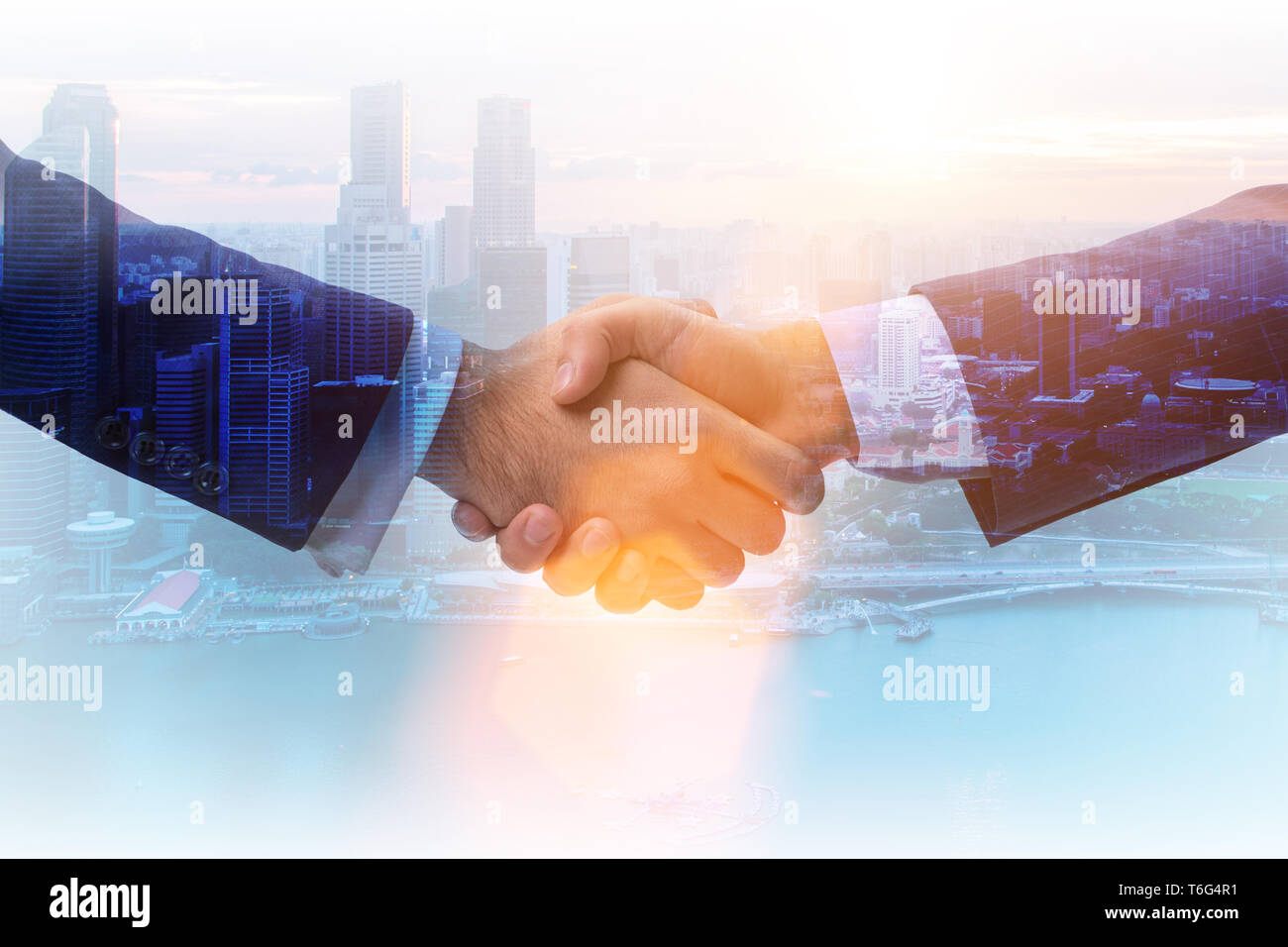Concept of cooperation with handshake Stock Photo - Alamy