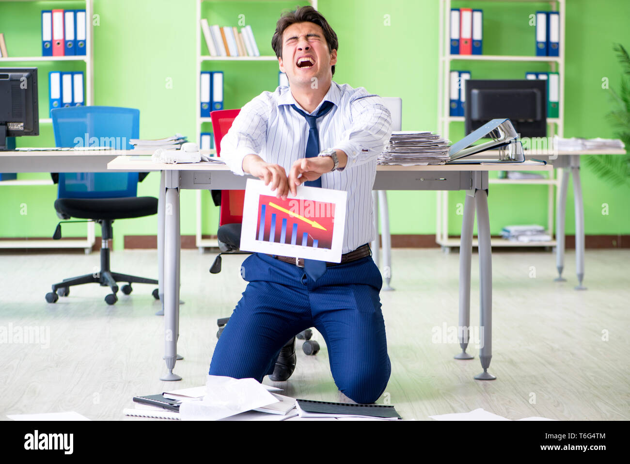 Frustrated businessman stressed from excessive work Stock Photo - Alamy