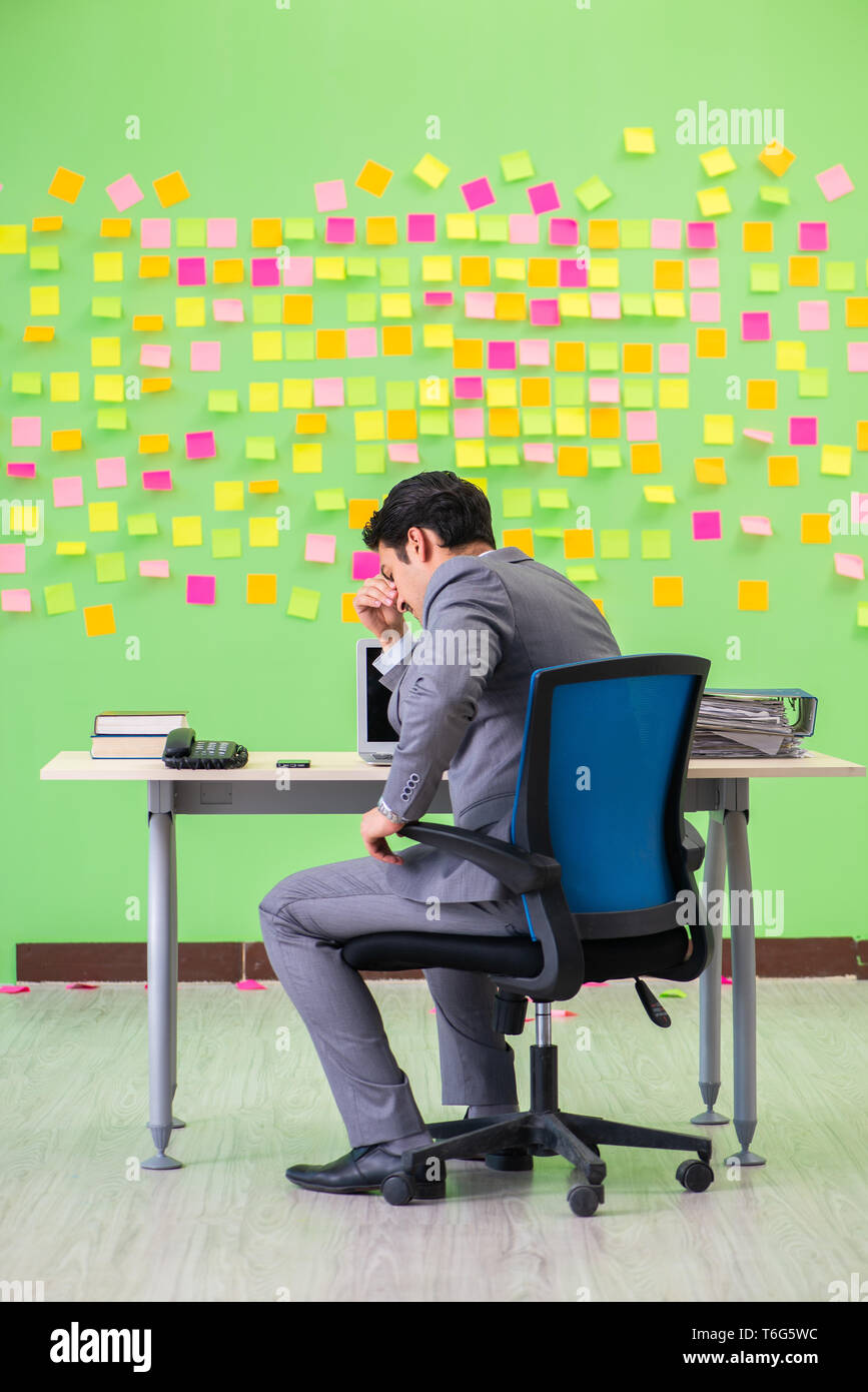 Businessman with many conflicting priorities Stock Photo - Alamy