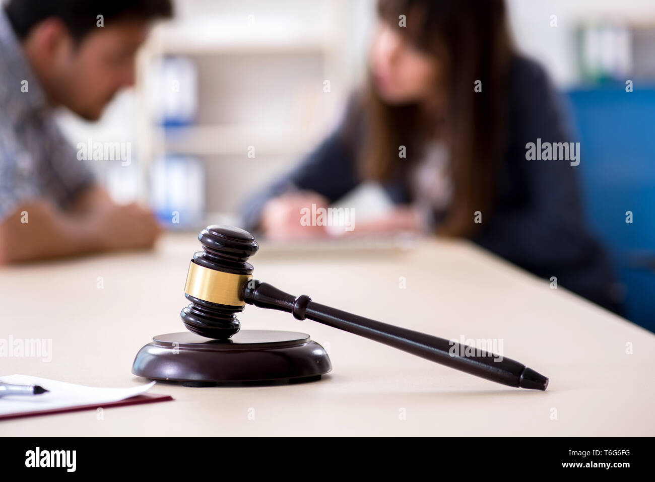 Female lawyer meeting with his male client in the office Stock Photo ...