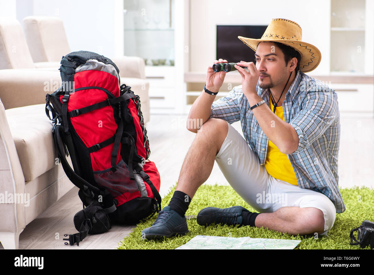 Man planning his travel with map Stock Photo - Alamy
