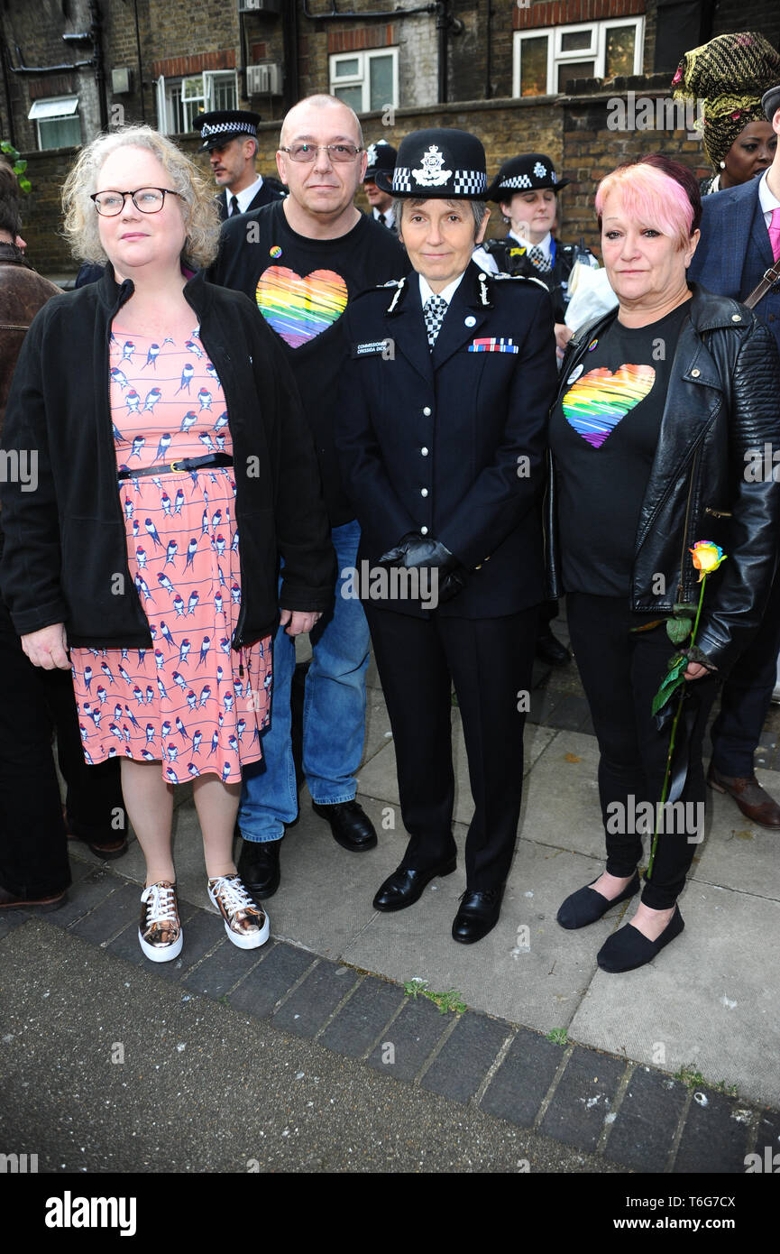 Cressida Rose Dick CBE and the family members of the victims are seen ...