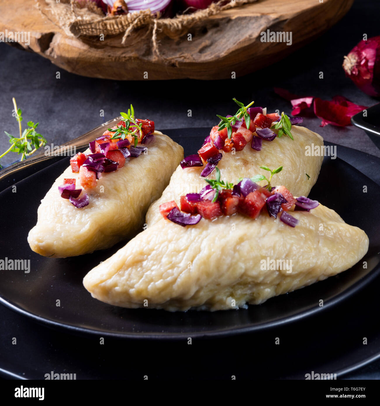 Rustic Cepelinai, a specialty Lithuanian and Polish cuisine Stock Photo ...