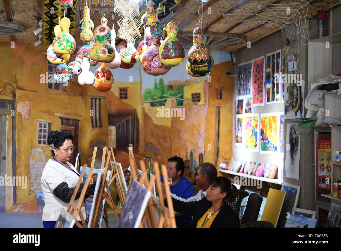 Awat, China's Xinjiang Uygur Autonomous Region. 30th Apr, 2019. Farmer ...
