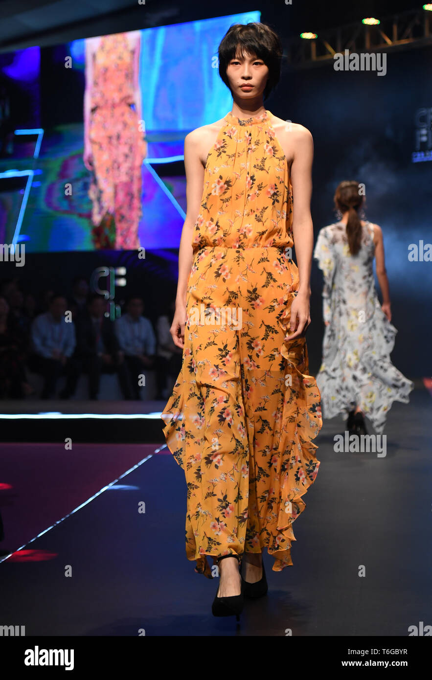 Guangzhou, China's Guangdong Province. 1st May, 2019. Models present ...