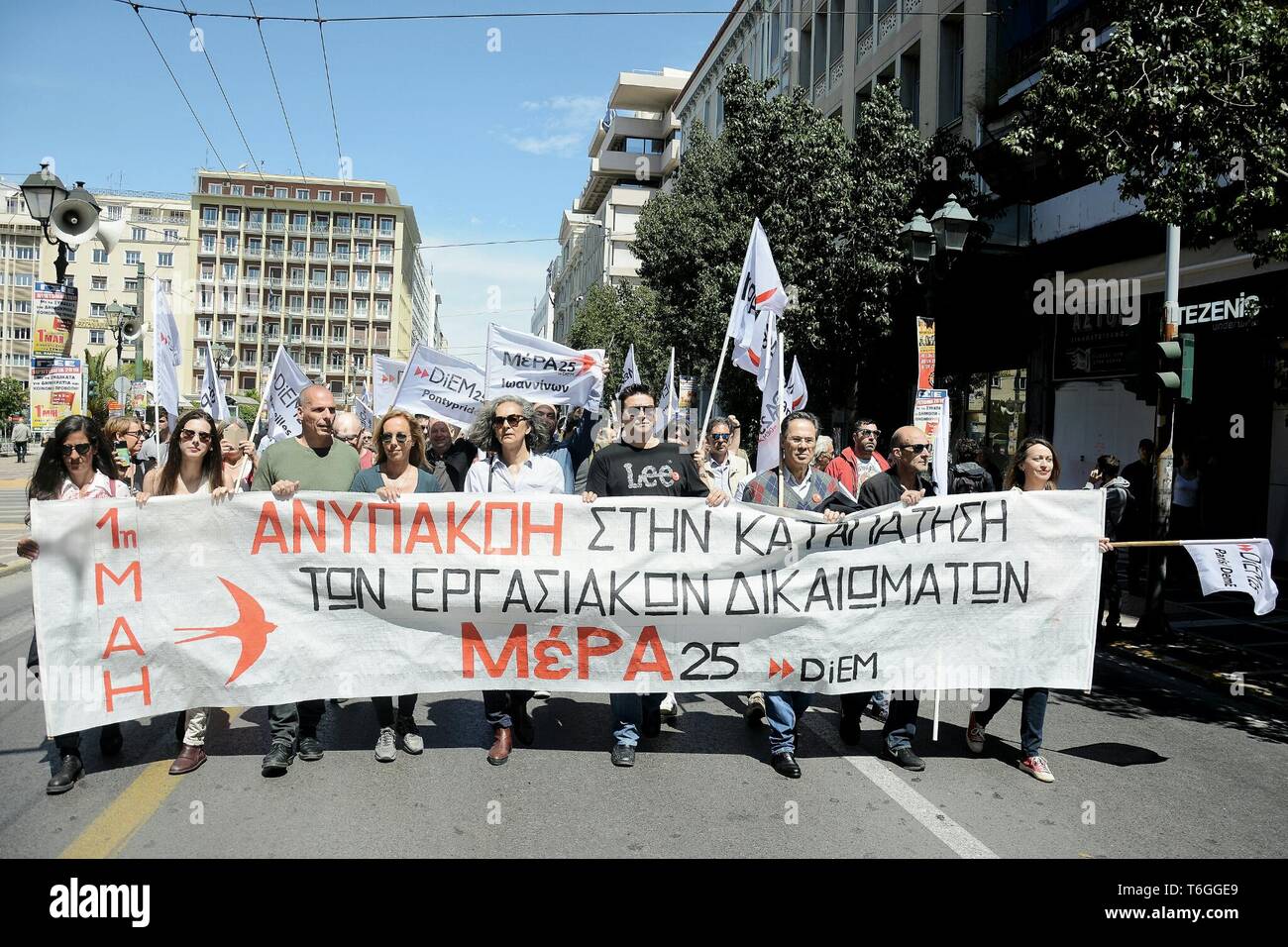 Athens, Greece. 1st May, 2019. Protesters seen with a huge banner ...
