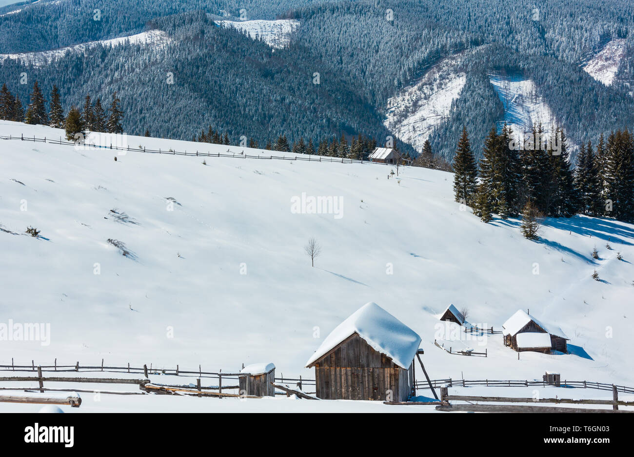 Winter snowy mountains, and lone farmhouse Stock Photo - Alamy