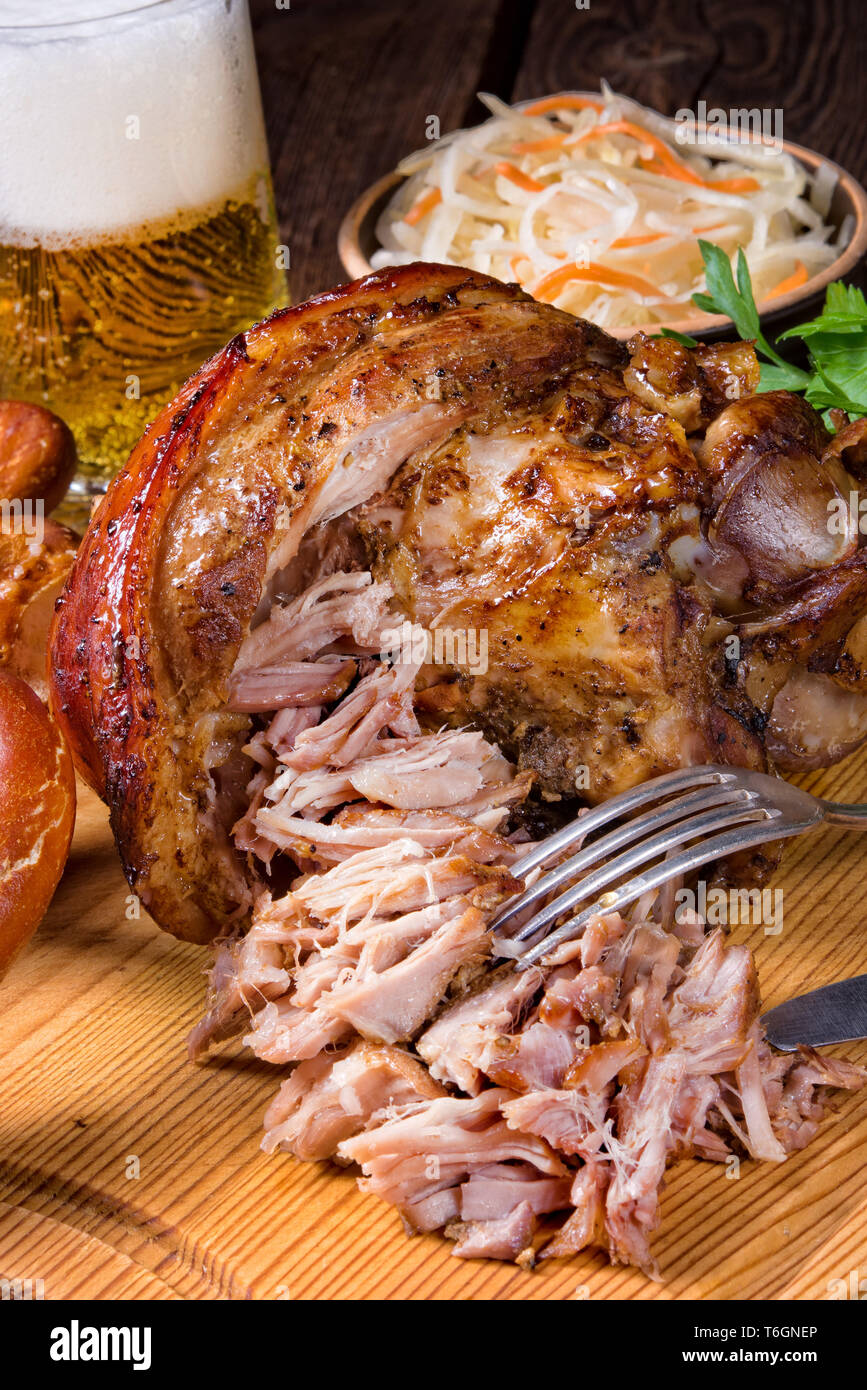 crisp and crusty original Eisbein in Bavarian Stock Photo - Alamy