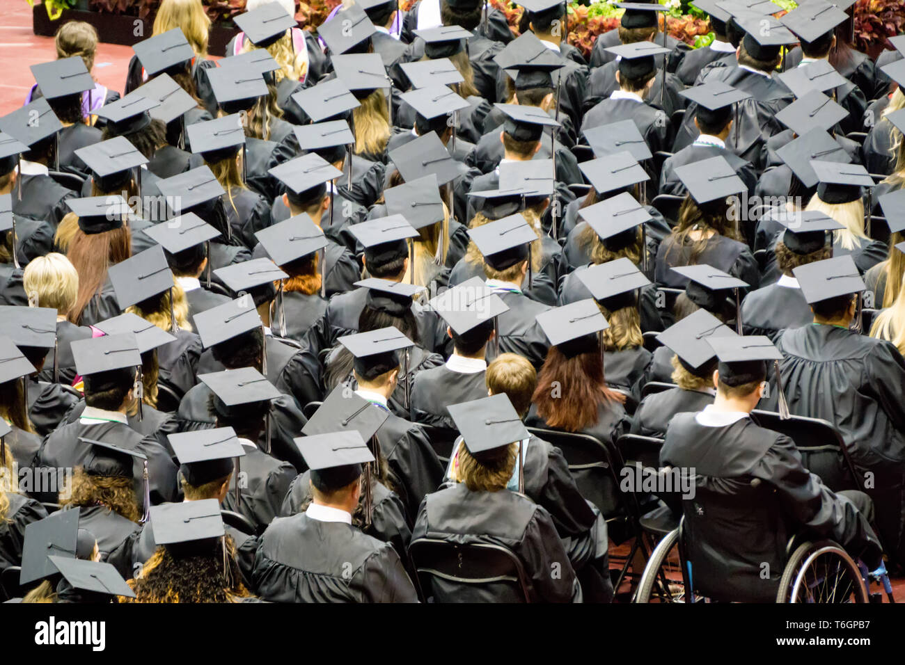 Graduates throwing caps hi-res stock photography and images - Alamy