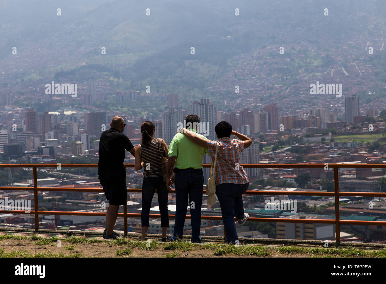 People looking Medellin from el Pueblito Paisa Stock Photo - Alamy