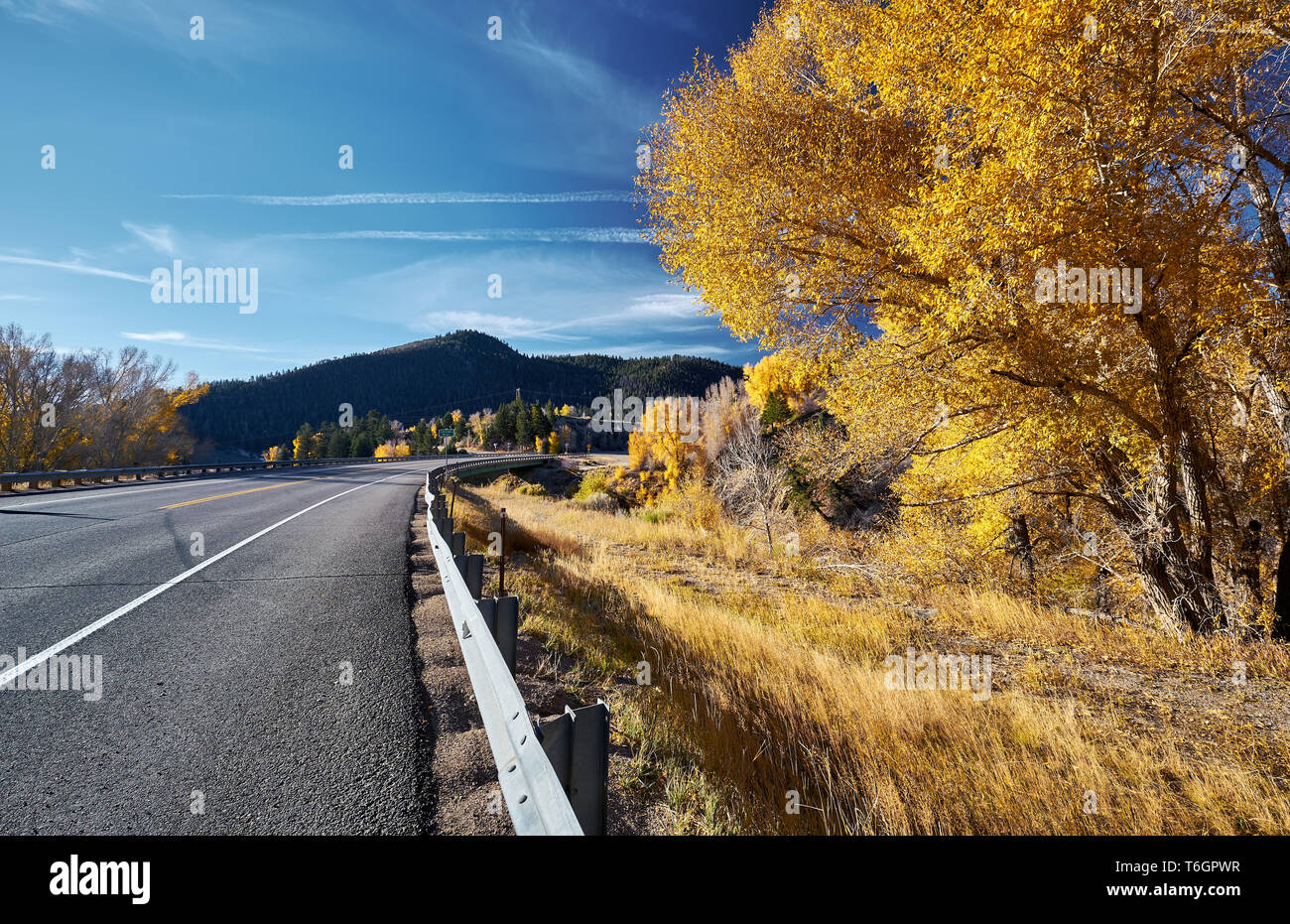 Highway at autumn in Colorado, USA Stock Photo - Alamy