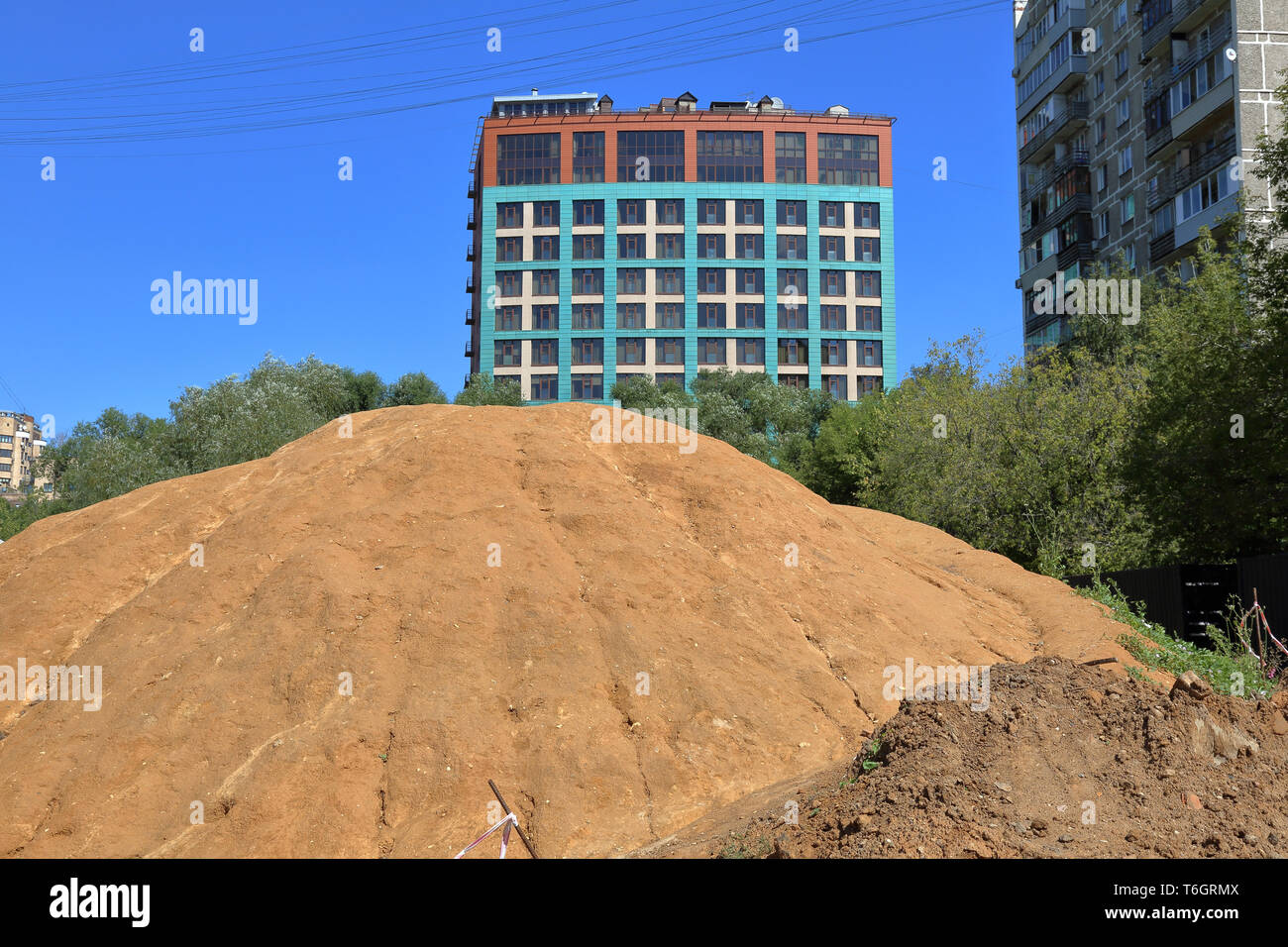 Pile of sand on a vacant lot Stock Photo - Alamy