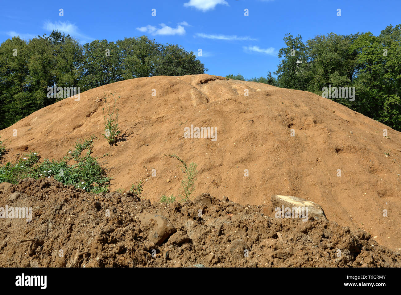 Pile of sand on a vacant lot Stock Photo - Alamy