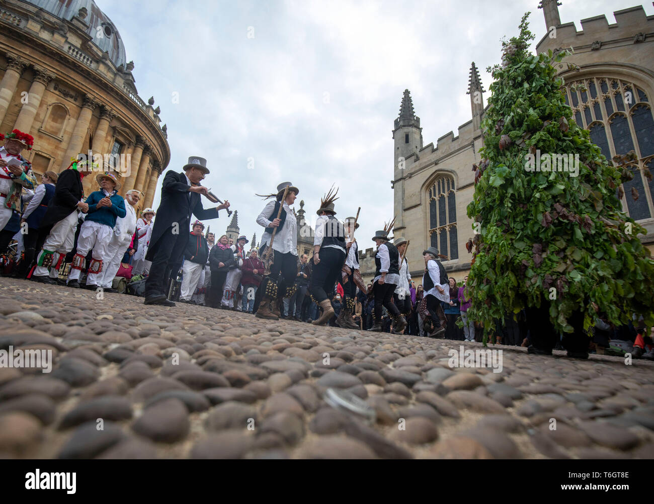 Morris dancers perform after the singing of madrigals from the tower of ...