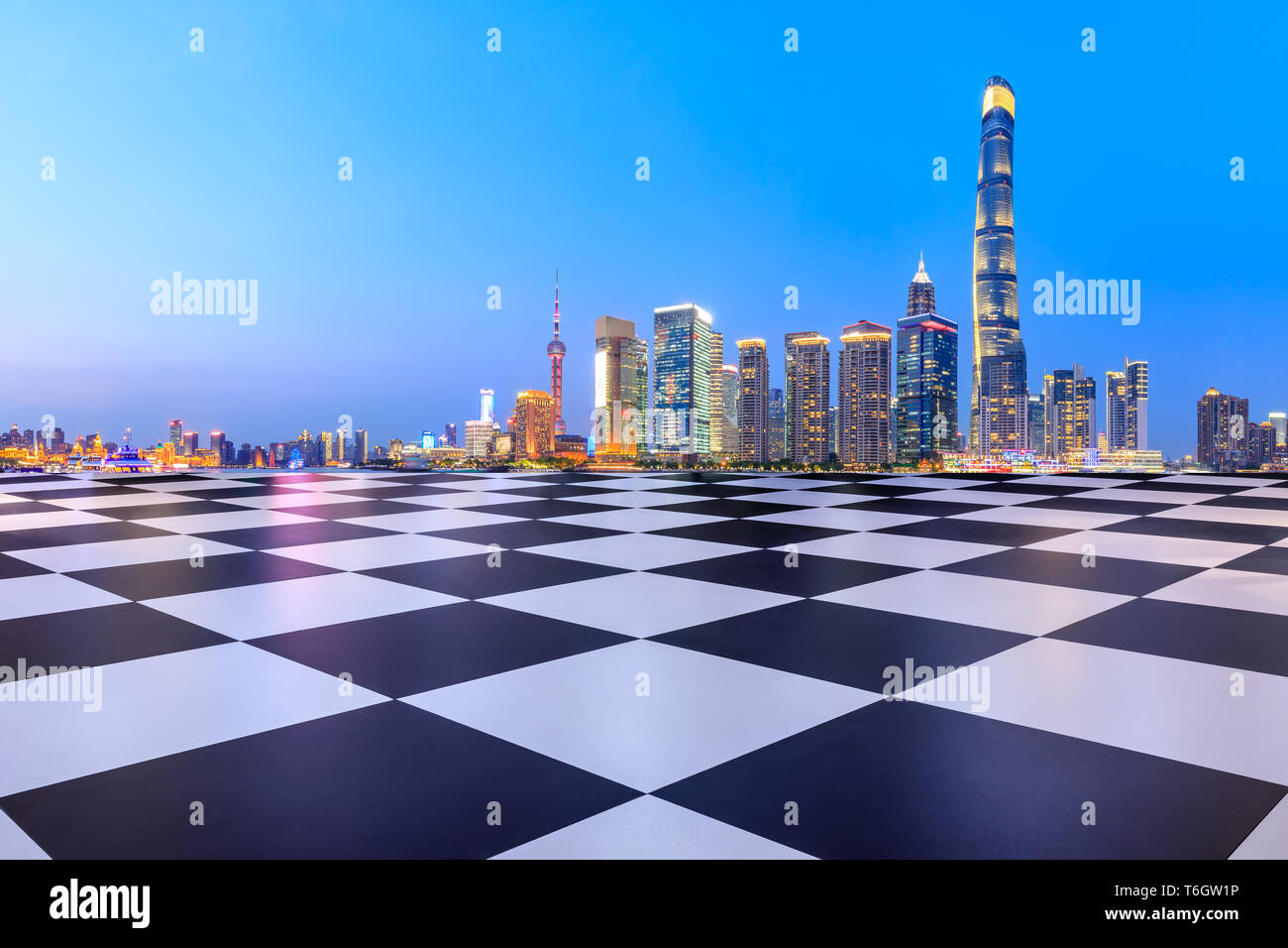 Shanghai modern commercial office buildings and square floor at night ...