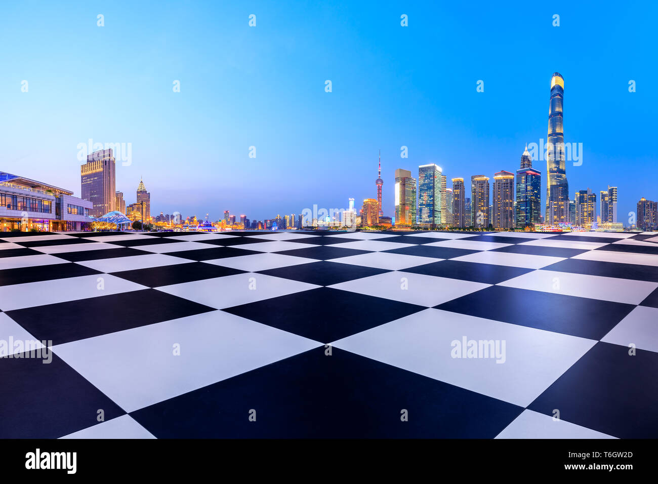 Shanghai modern commercial office buildings and square floor at night ...